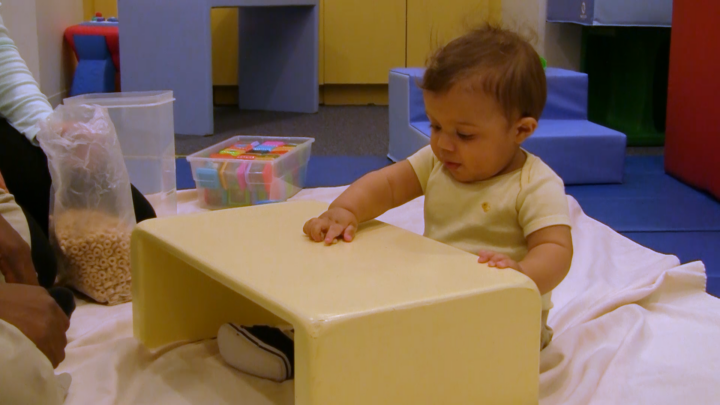 Pathways.org | Picks up small objects with thumbs and fingers
